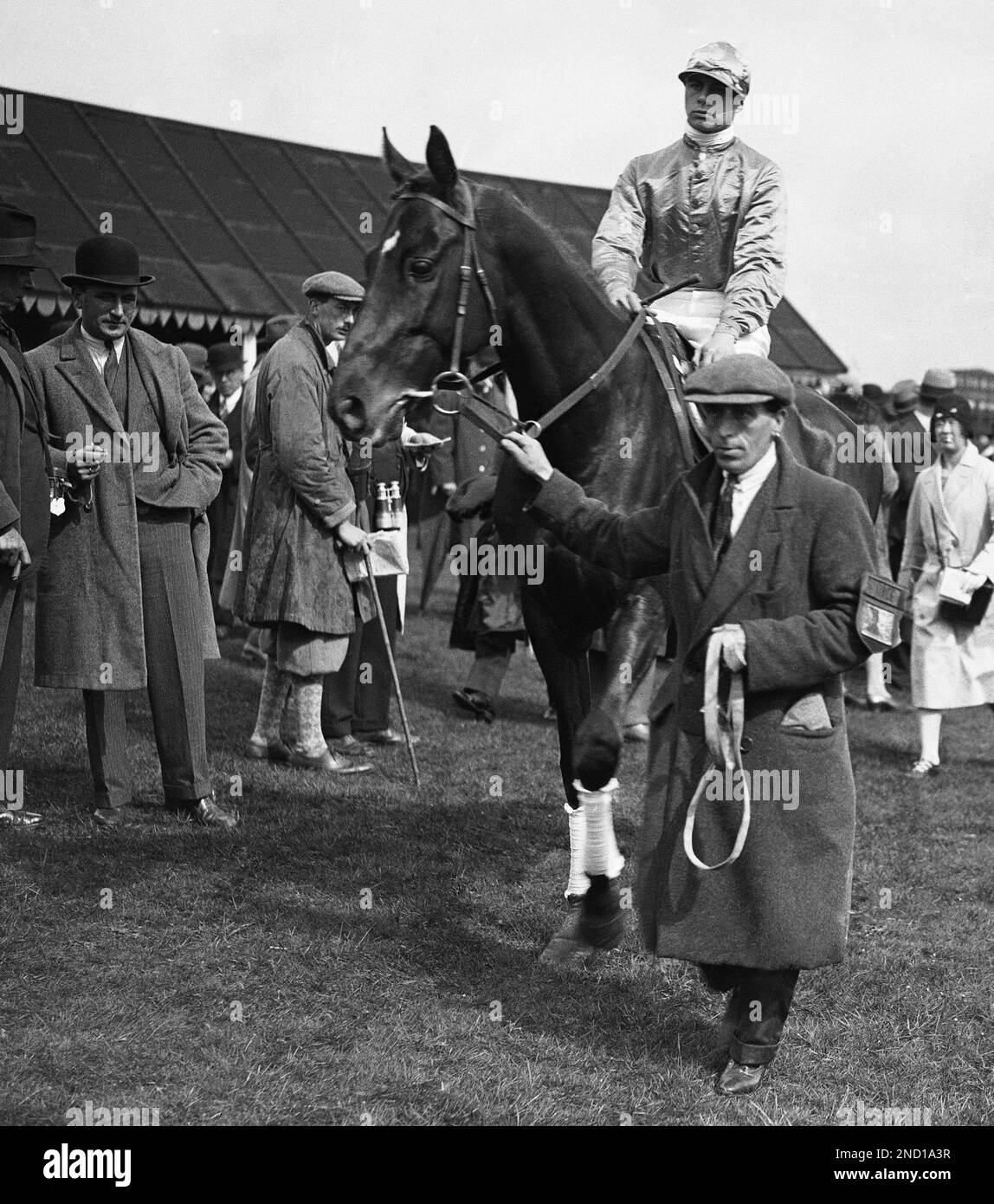 Prince Aly Khan, son of the Aga Khan III, unseen, going out for the ...