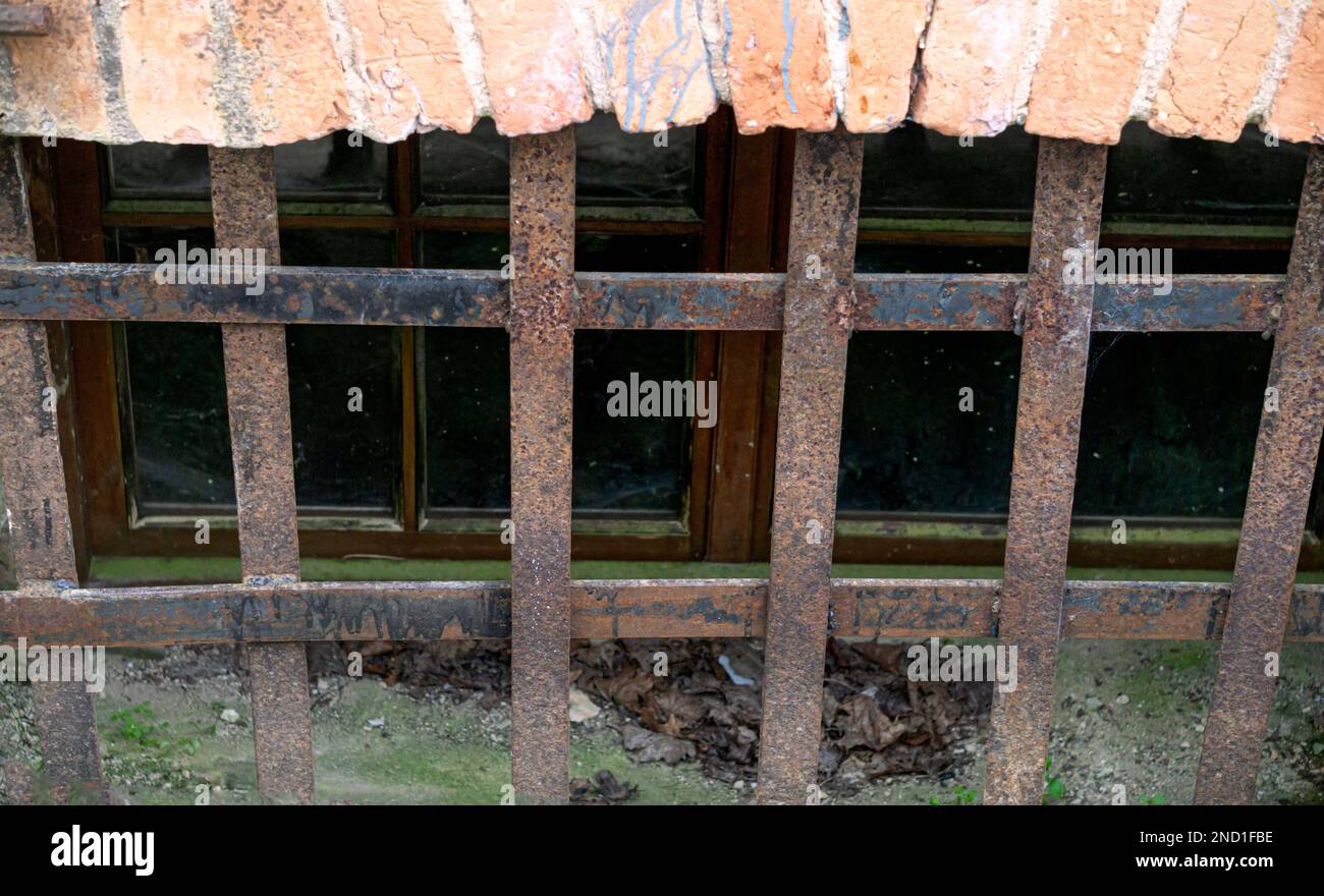 Old rusty metal grate on the basement window Stock Photo - Alamy