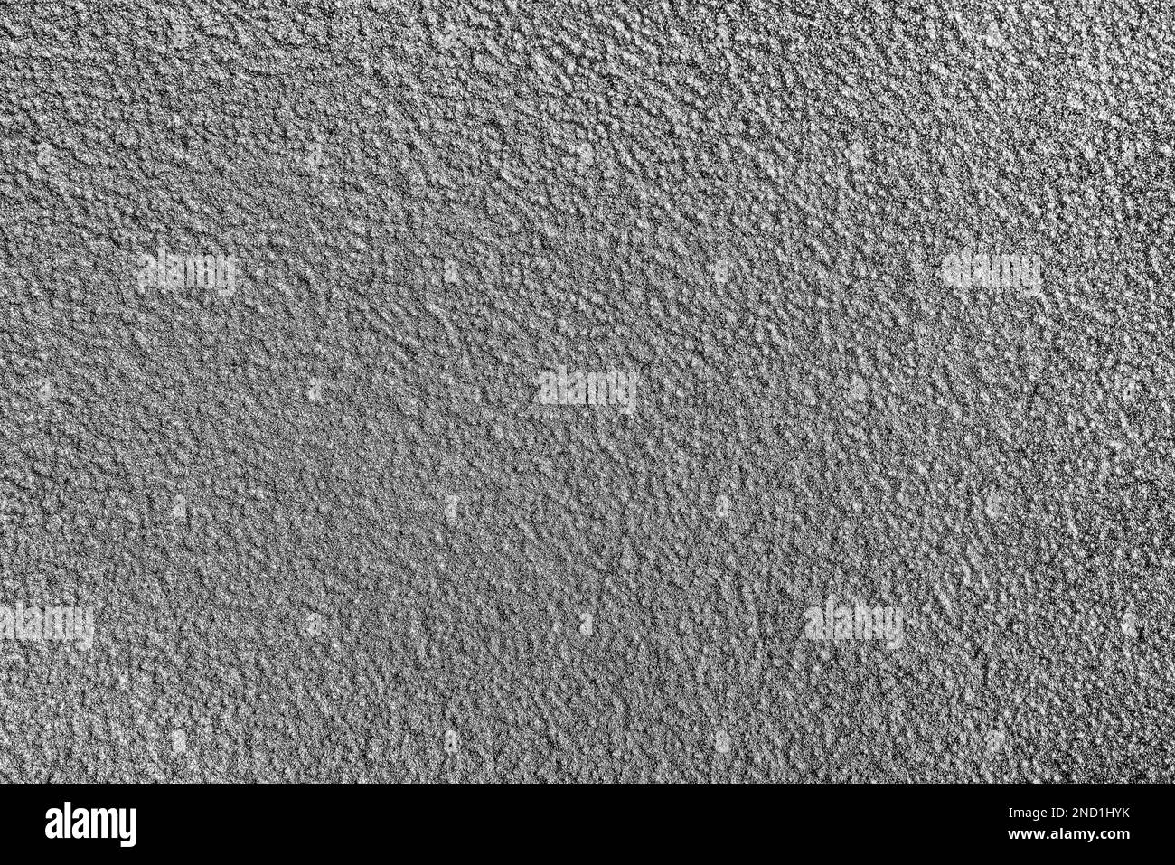 Monochrome texture of shiny grained metal. Abstract background for ...