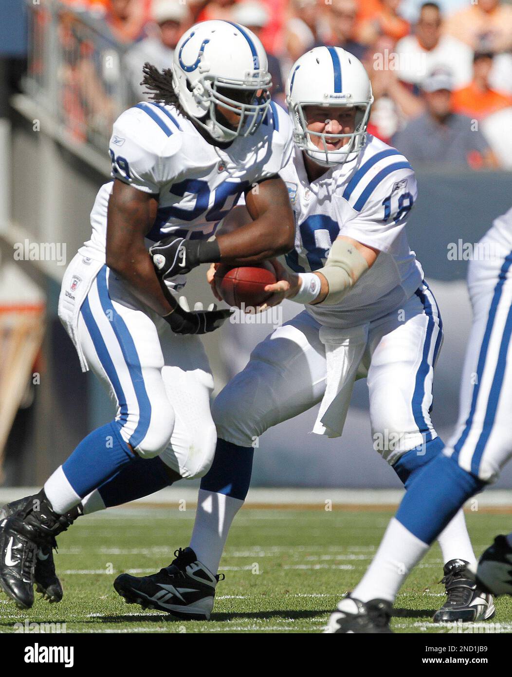 Indianapolis Colts quarterback Peyton Manning fakes a hand-off to ...