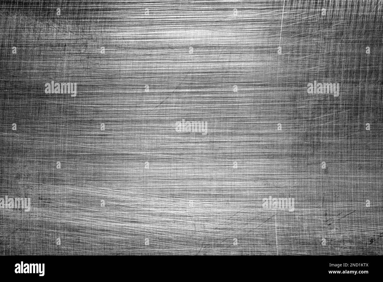 Monochrome texture of shiny scratched metal. Abstract background for ...
