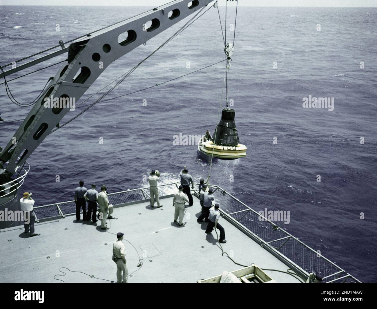 Astronaut Leroy Gordon Cooper and his space capsule, Faith 7, are ...