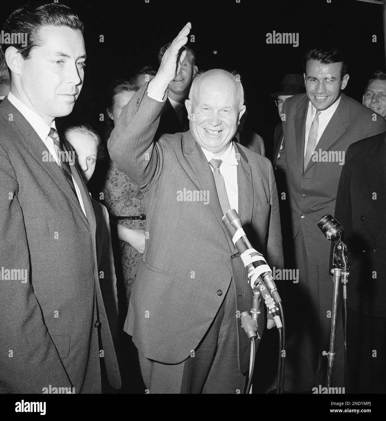 Soviet Premier Nikita Khrushchev waves goodbye as he leaves the soviet ...