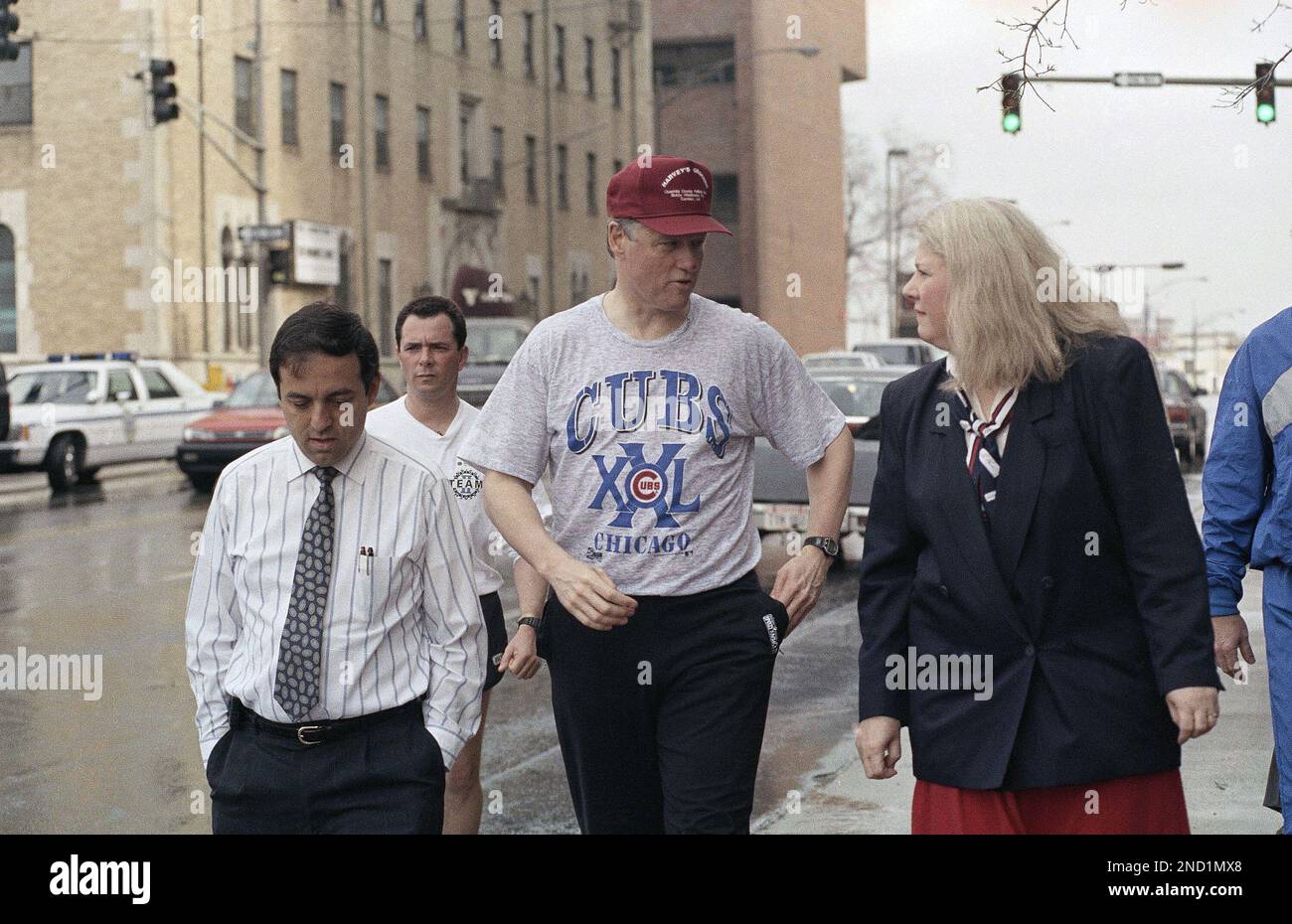 President Bill Clinton, center, speaks with childhood friends Carolyn ...
