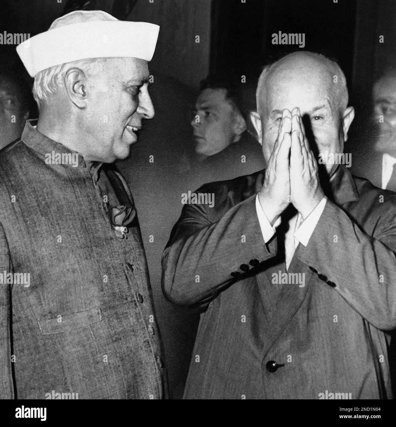Soviet Premier Nikita Khrushchev gives the Indian sign of greeting to ...
