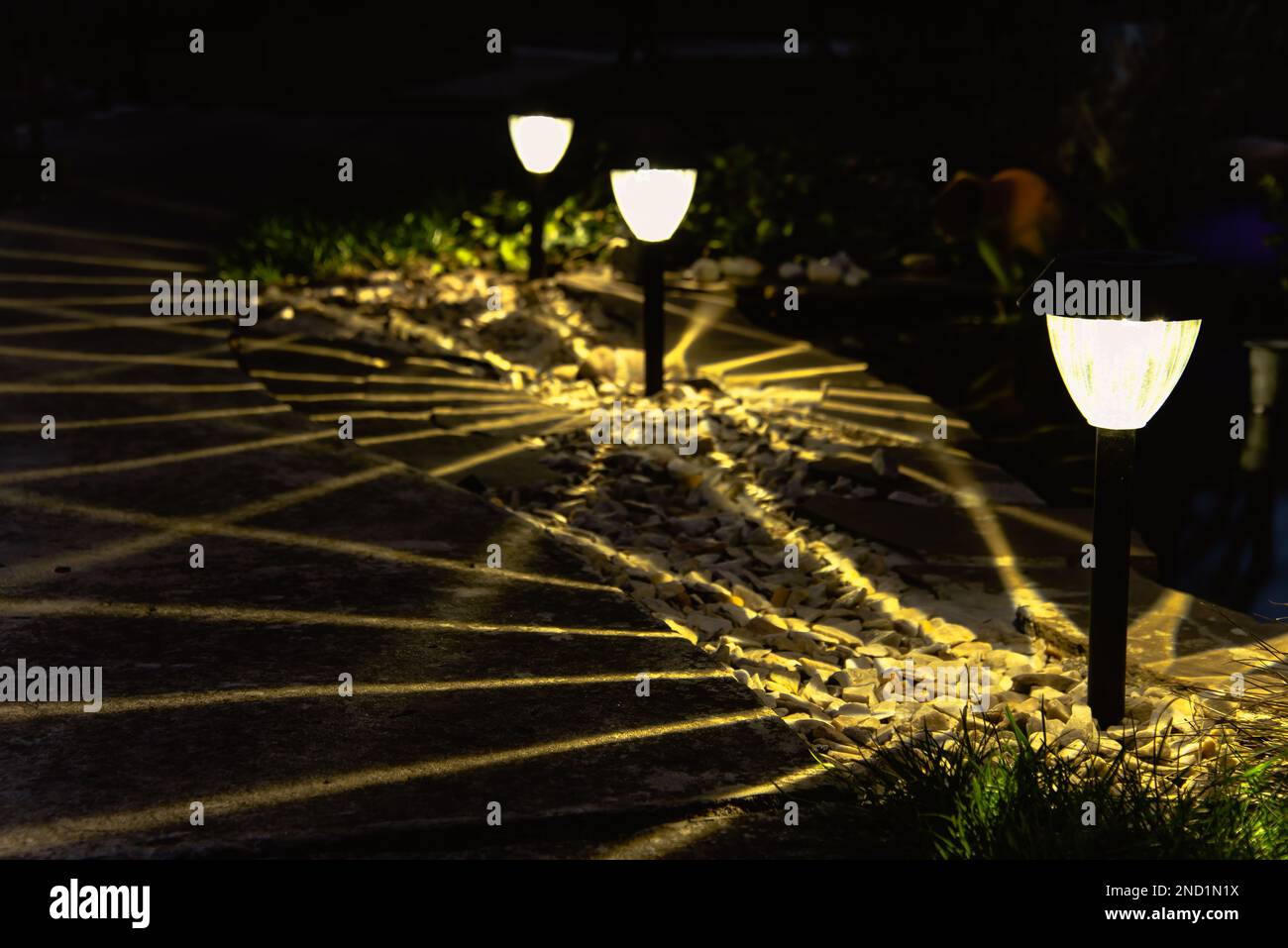 Decorative Small Solar Garden Light, Lanterns In Flower Bed. Garden ...