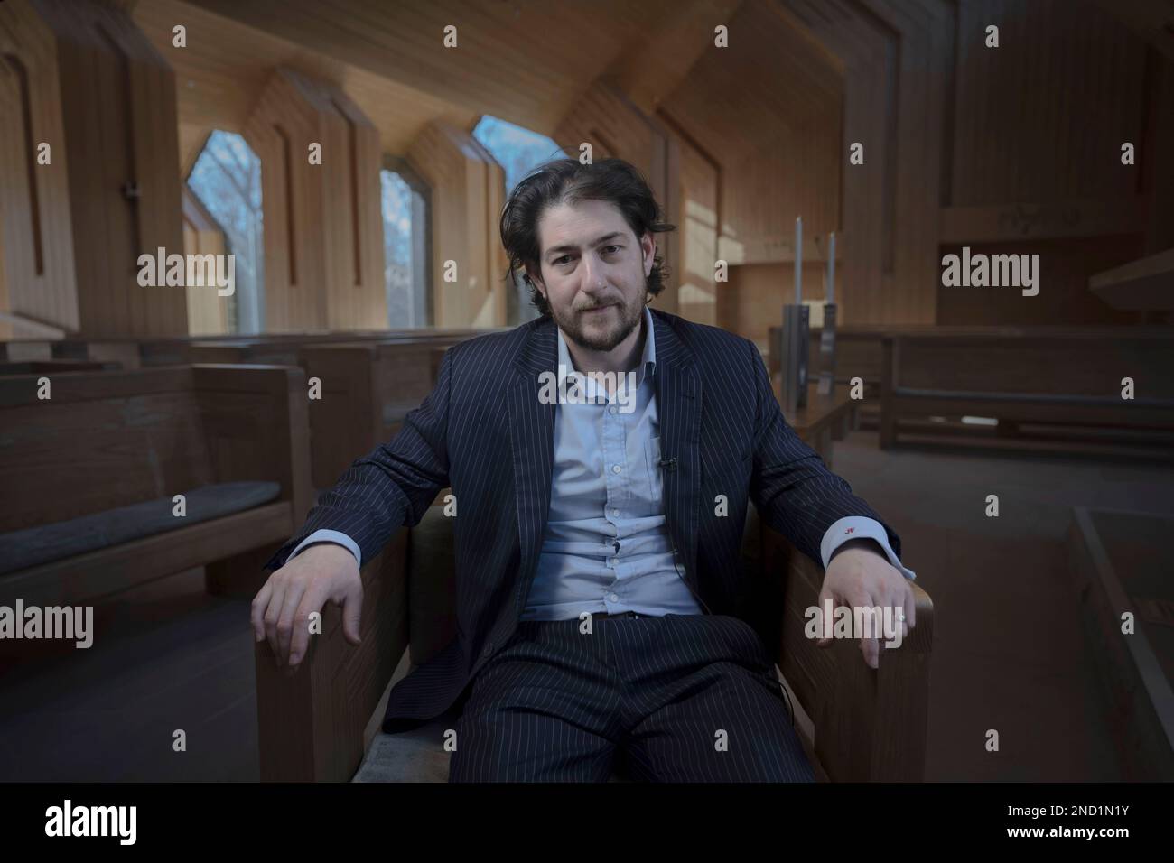 Rabbi Joshua Franklin poses for a portrait inside the sanctuary at the ...
