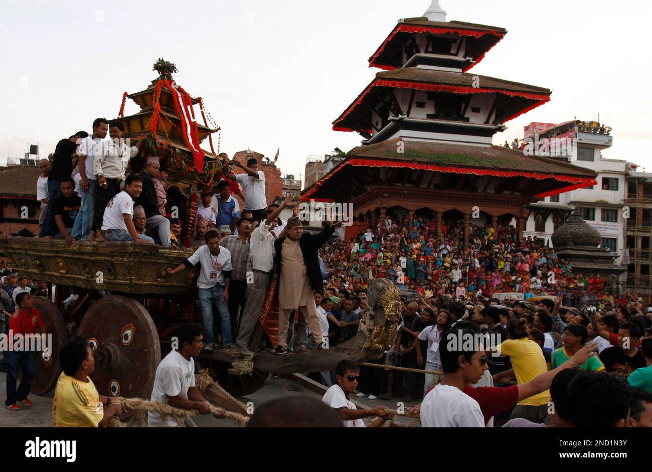 Nepalese devotees pull a chariot of living goddess locally known as ...