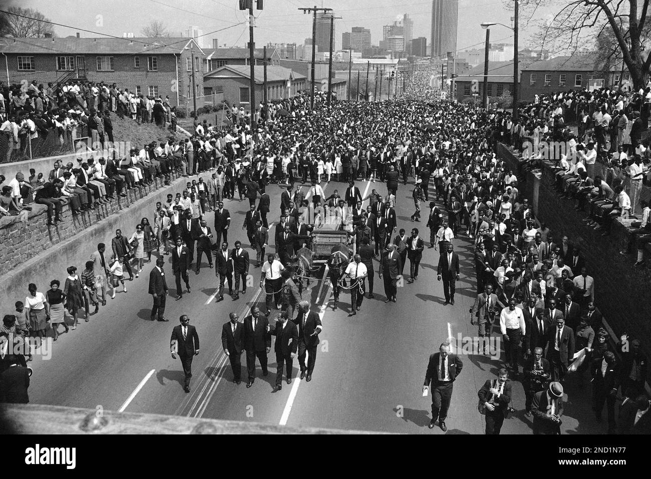 The mule-drawn casket of Dr. Martin Luther King Jr. leads thousands of ...