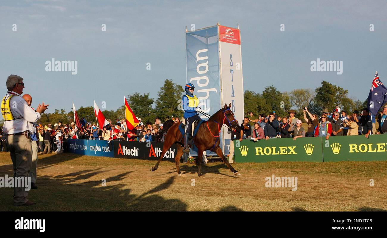 Maria Mercedes Alvarez Ponton from Spain rides Nobby across the finish ...
