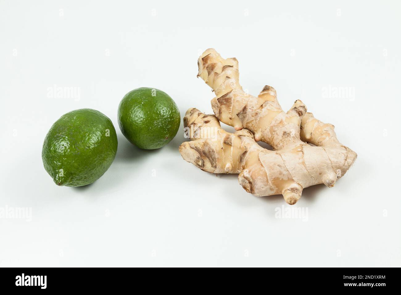 Ginger and lemons root; photo on neutral background Stock Photo - Alamy