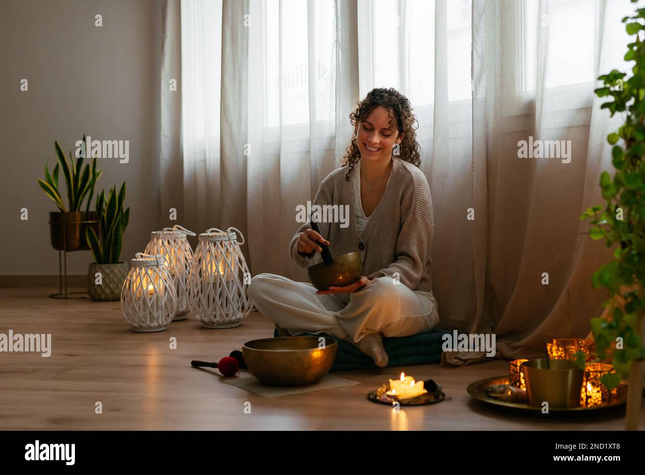 Full body of positive young female with curly dark hair in casual ...