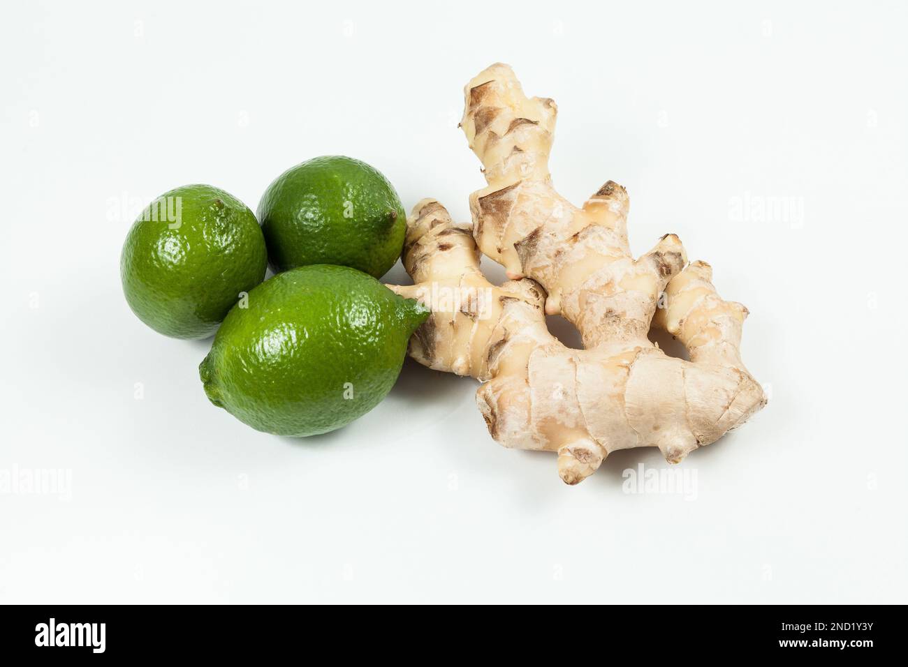 Ginger and lemons root; photo on neutral background Stock Photo - Alamy