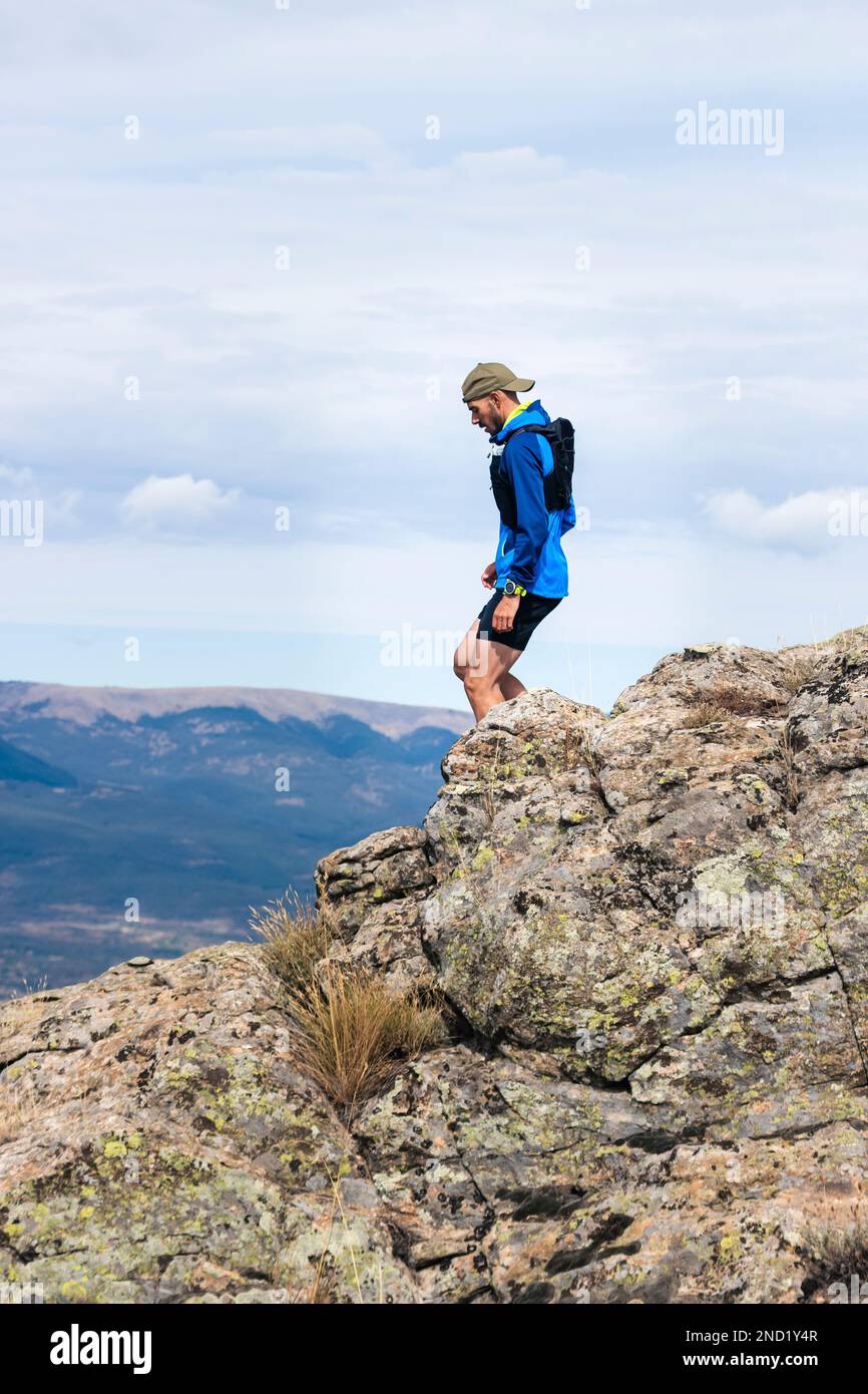Young man running on trail hi-res stock photography and images - Alamy