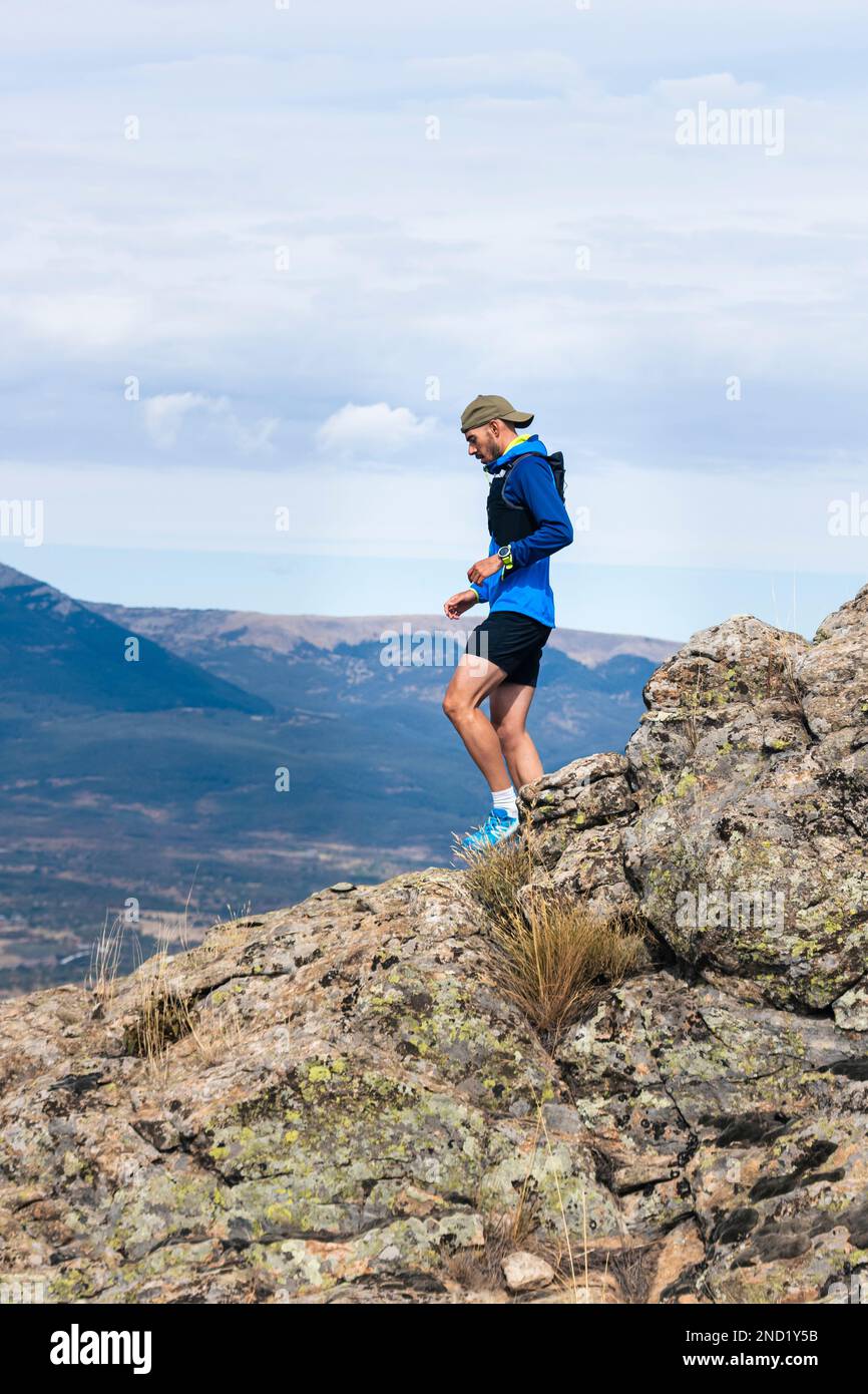 Young man running on trail hi-res stock photography and images - Alamy