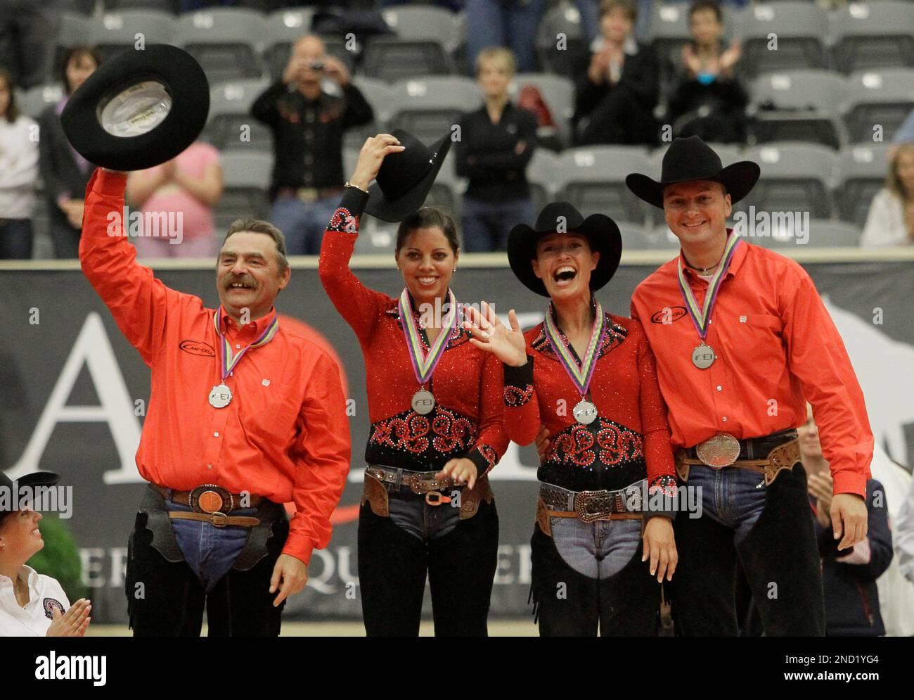 Members of the silver medal team from Belgium in the world reining ...