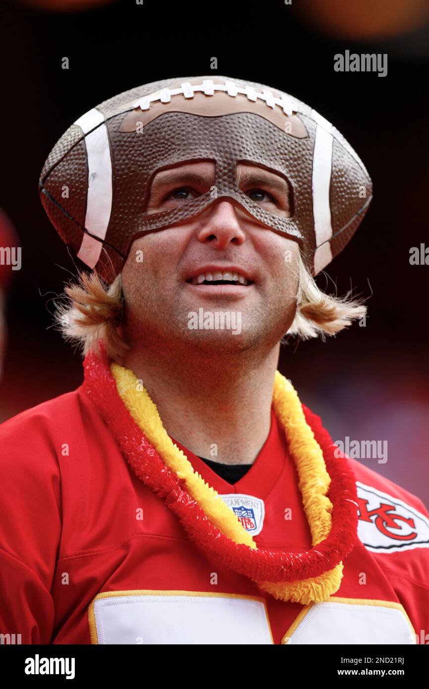 A Kansas City Chiefs fan watches pre-game warm ups before a NFL ...