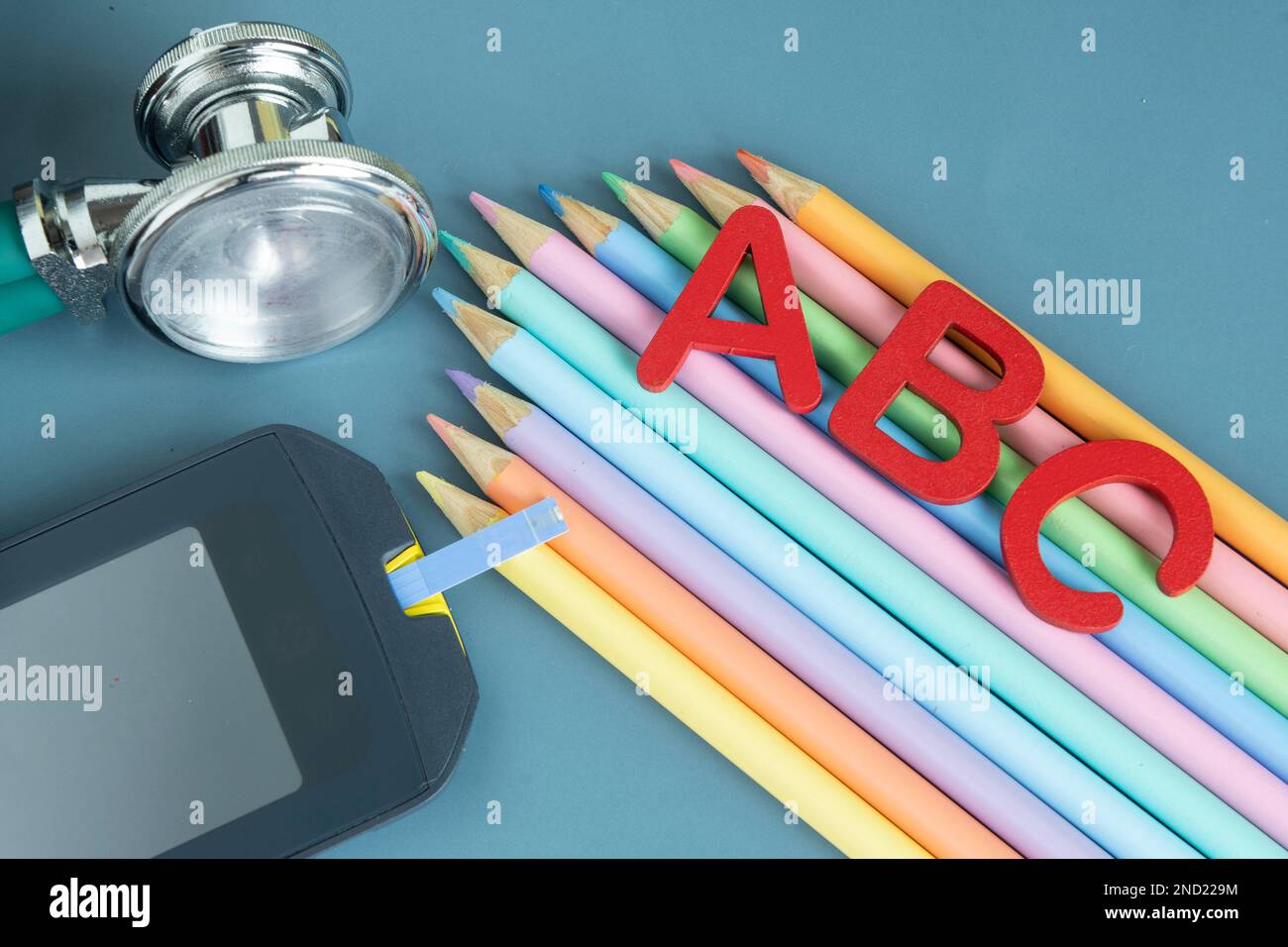 Back to school concept for kids with diabetes represented by colored ...