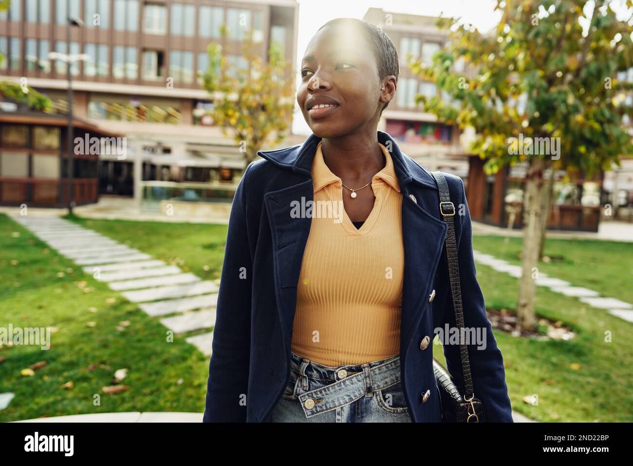 Stylish african female student near university campus Stock Photo - Alamy