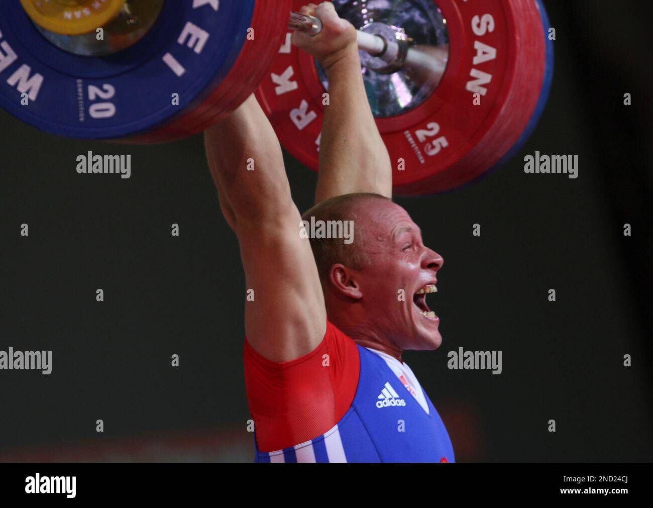Russia's Andrey Demanov competes in the men's 94 kg category at the ...