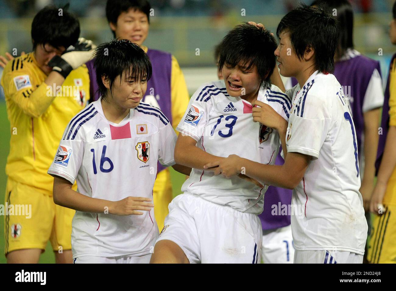 Japan's players, front from left to right, Chika Kato, Tomoko Muramatsu ...