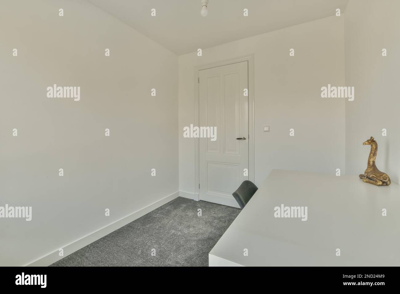 Interior design of modern room with desk and chair placed near door ...