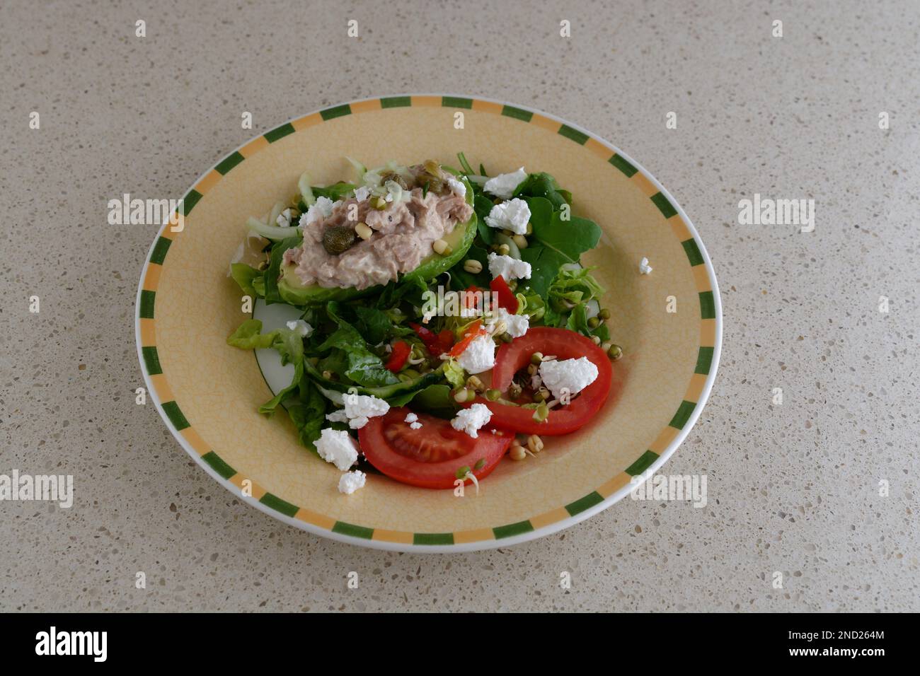 Avocado and Tuna Salad - 0n a bed of Rocket plus sliced tomatoes and ...