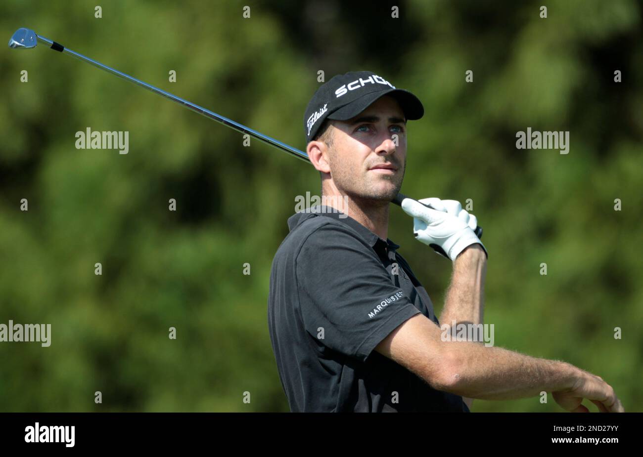Geoff Ogilvy of Australia, watches his tee shot on the second hole ...