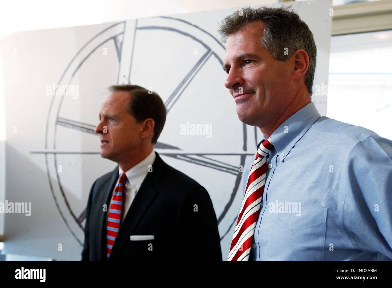 Pennsylvania Republican Senate candidate Pat Toomey, left, accompanied ...