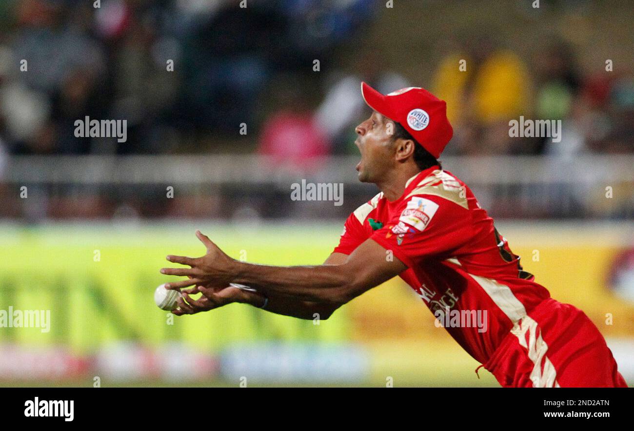 Royal Challengers Bangalore's Akhil Balachandra drops a catch off ...