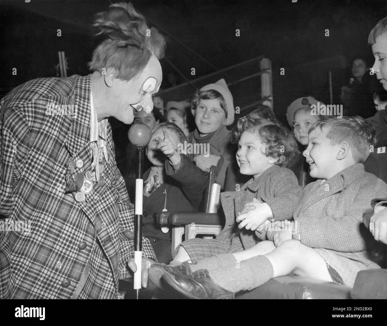 Sheila Ann Baker, 6, and her brother Kenneth, age 4, chat with Coco the ...