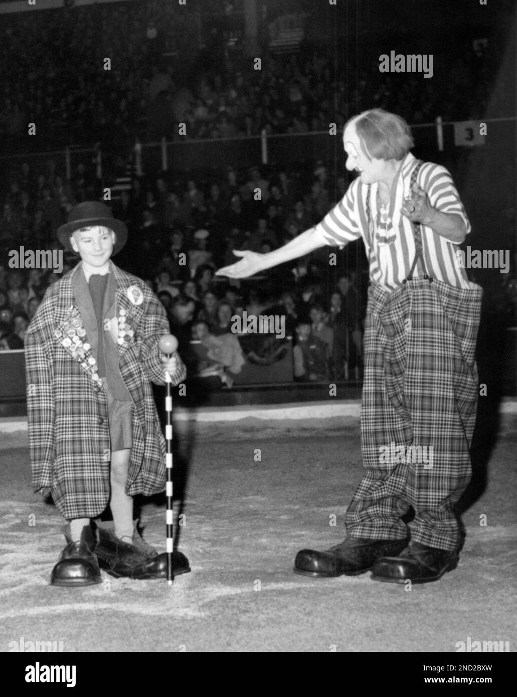 Coco the clown gives seven-year-old John Goss of Romford, Essex, a ...