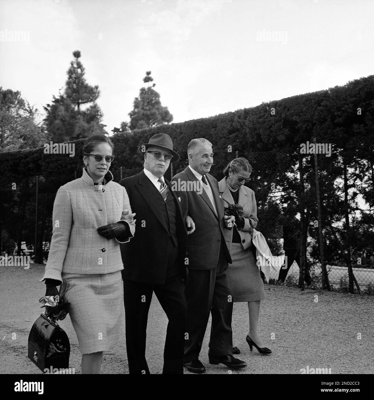 Charlie Chaplin, with his wife Oona, and Chaplin's brother Sydney on ...