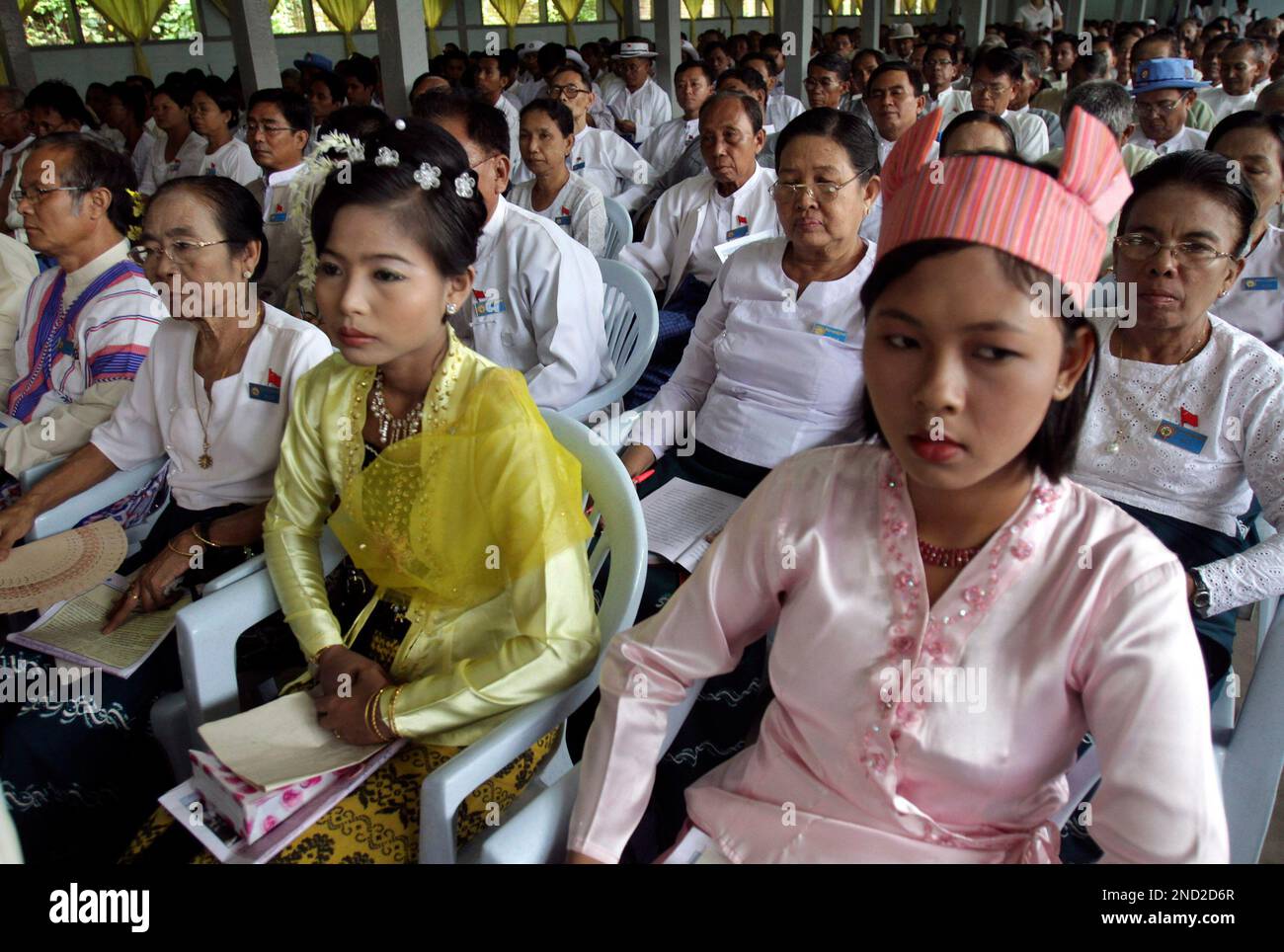 Clad in traditional costumes of national races, members of the National ...