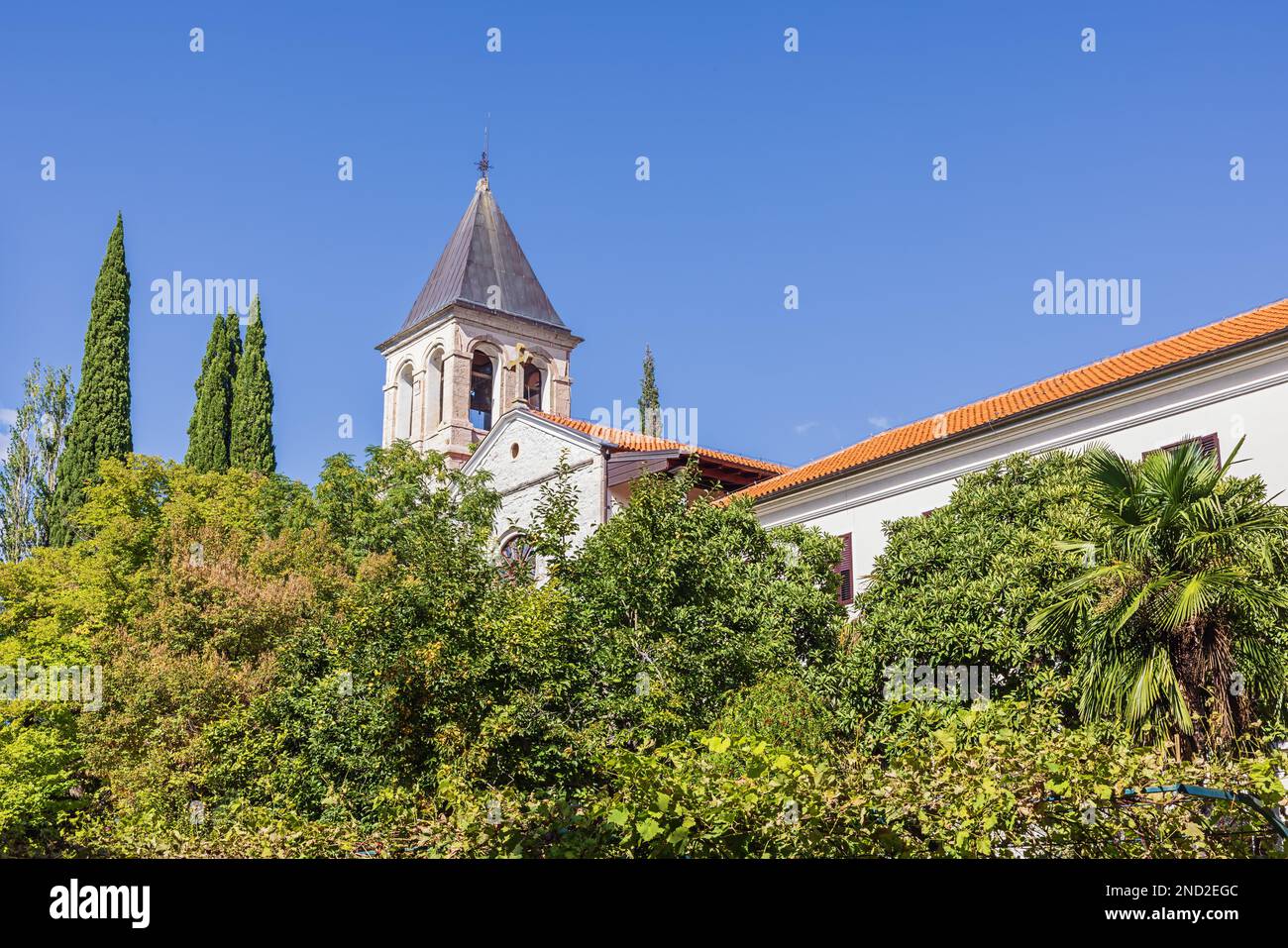 The Visovac Monastery rising high above its garden in the Krka National ...