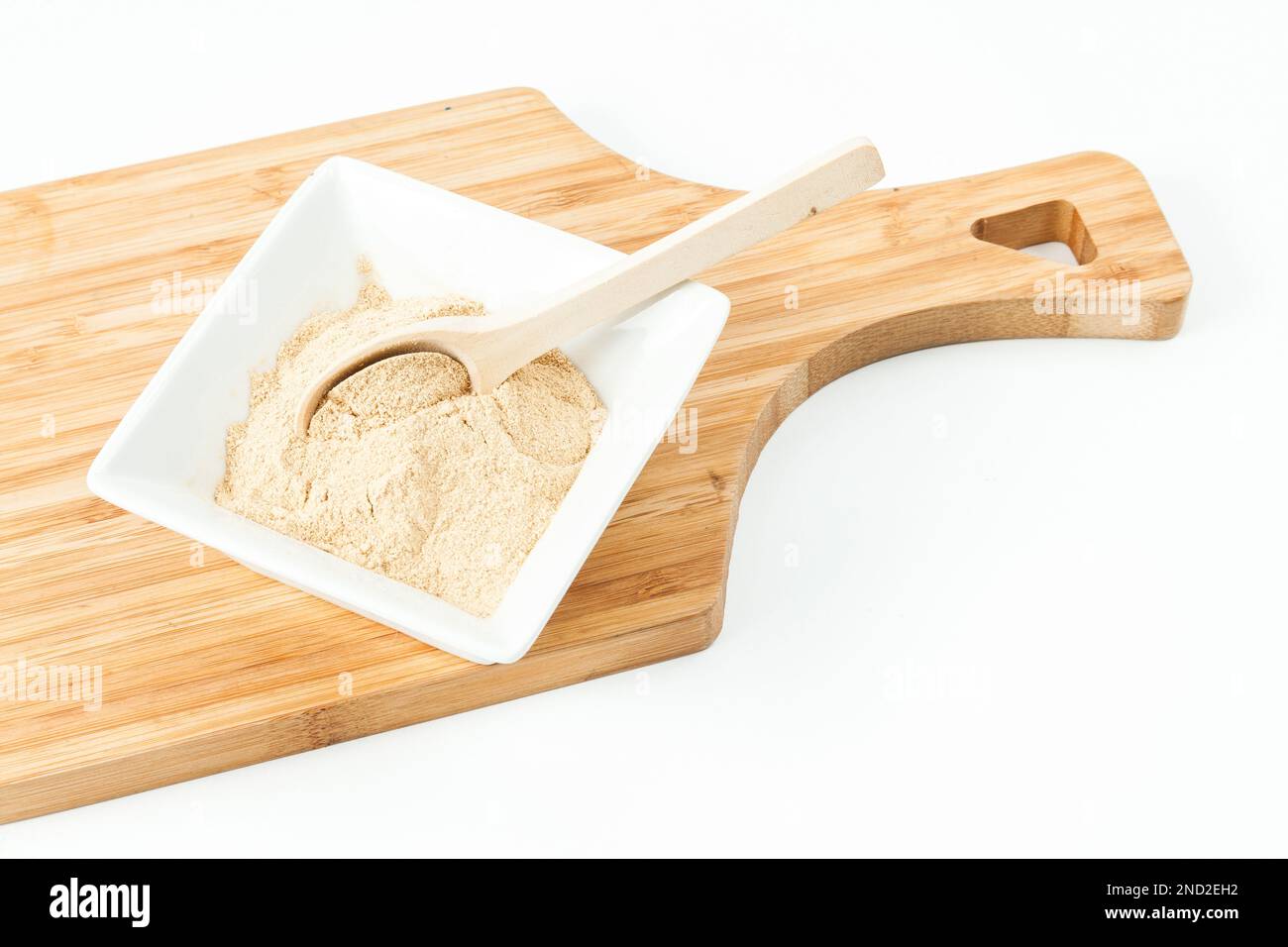 Ginger root powder photo on neutral background Stock Photo - Alamy