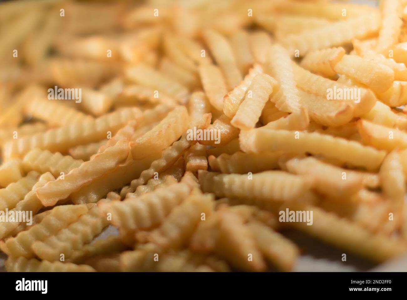 French fries are cooking in the oven Stock Photo - Alamy