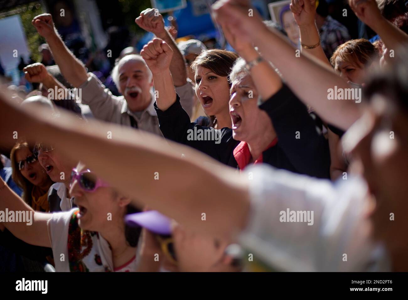 Baharan Taraj, center, and her aunt Maleheh Hosseini, right, both of ...