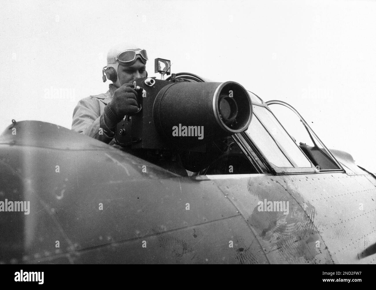 Joseph Pietsker, AVG photographer, operates aerial camera from two ...
