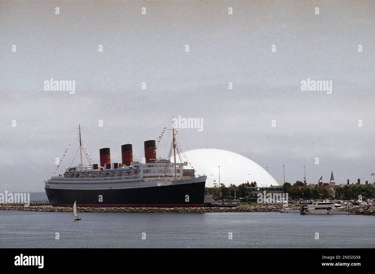The famous luxury liner Queen Mary sits docked in the Port of Long ...