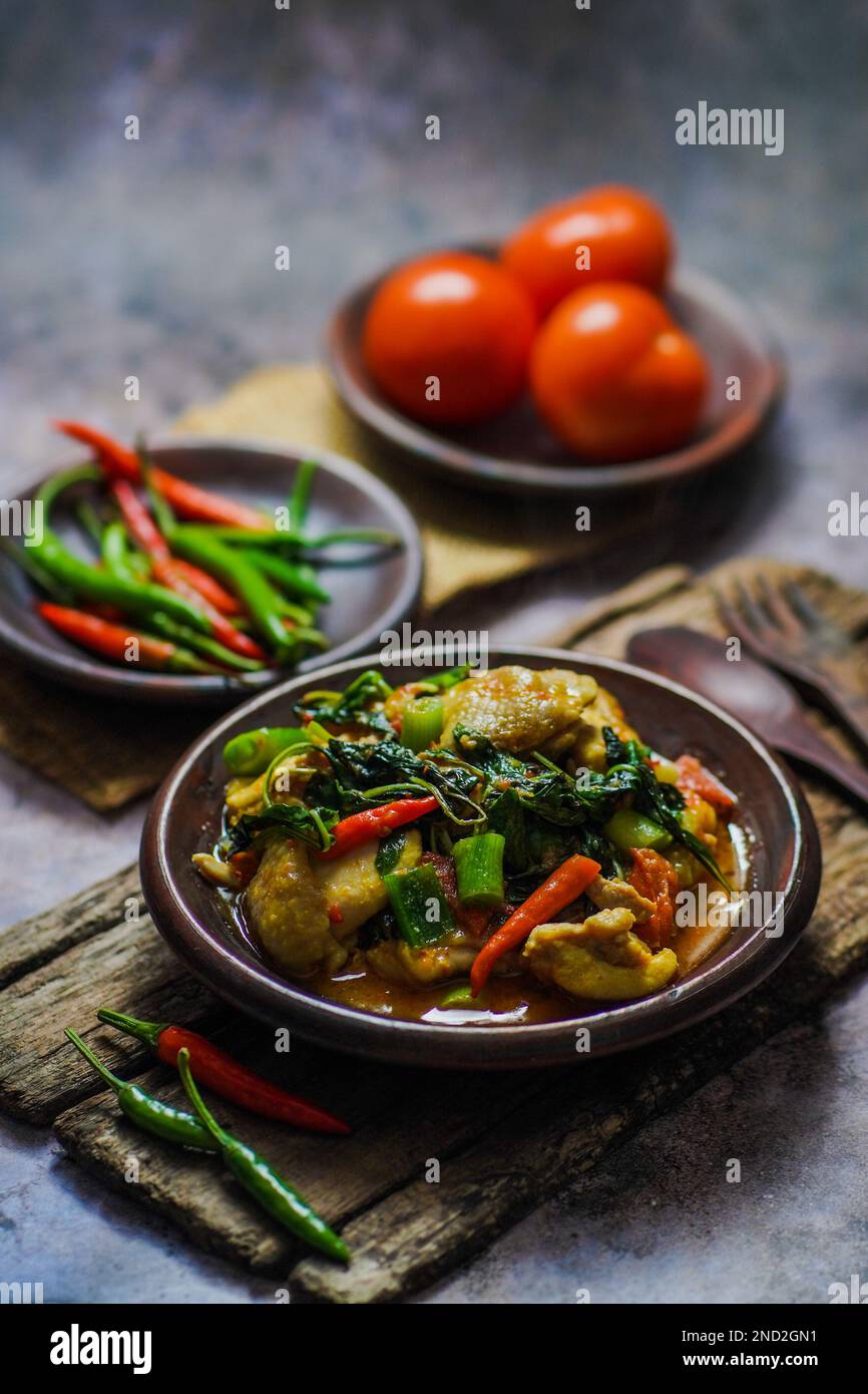 Chicken Woku or Ayam Woku is Spicy basil chicken from Manado, Indonesia ...