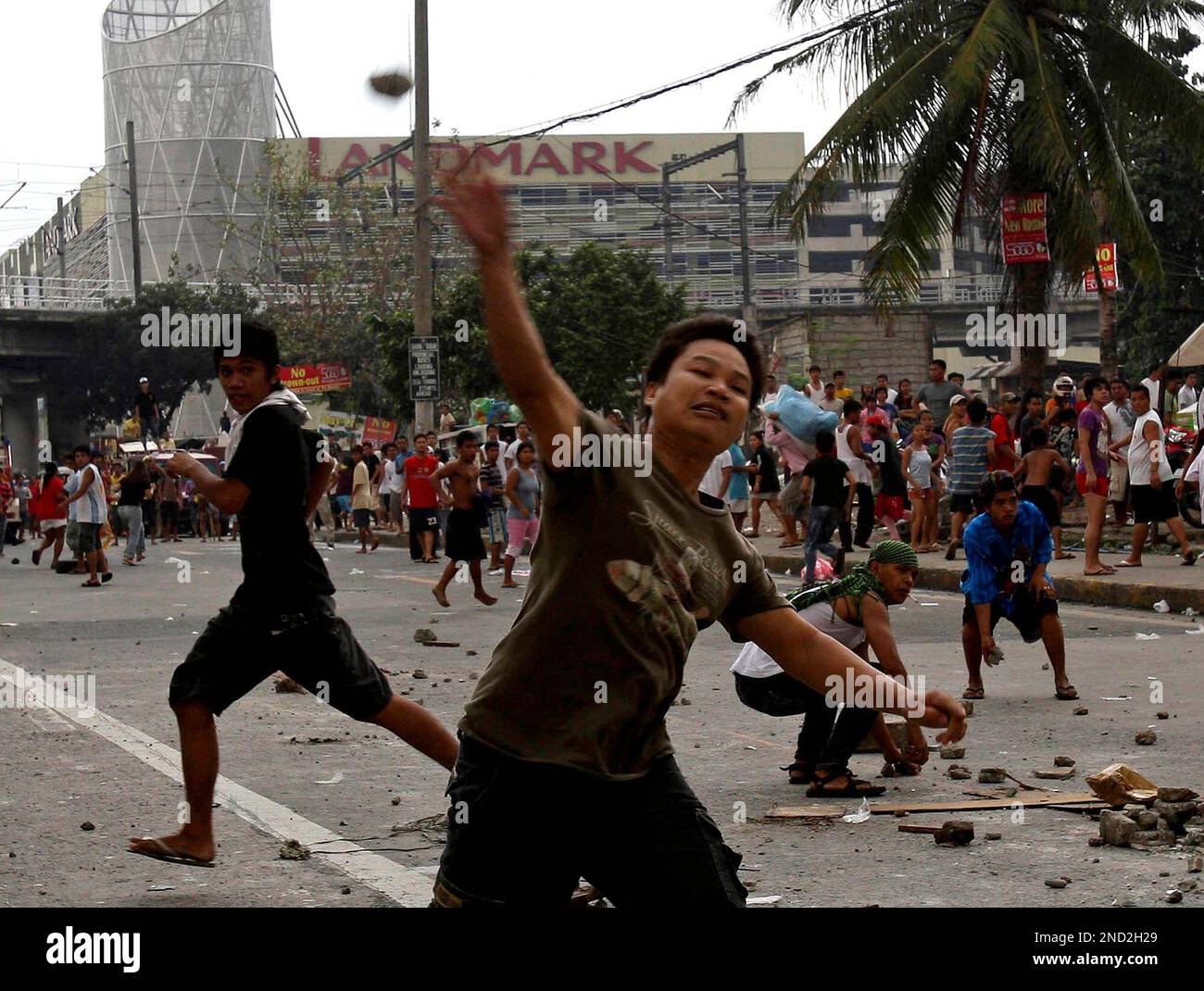 Residents throw rocks at police and demolition crew to resist ...