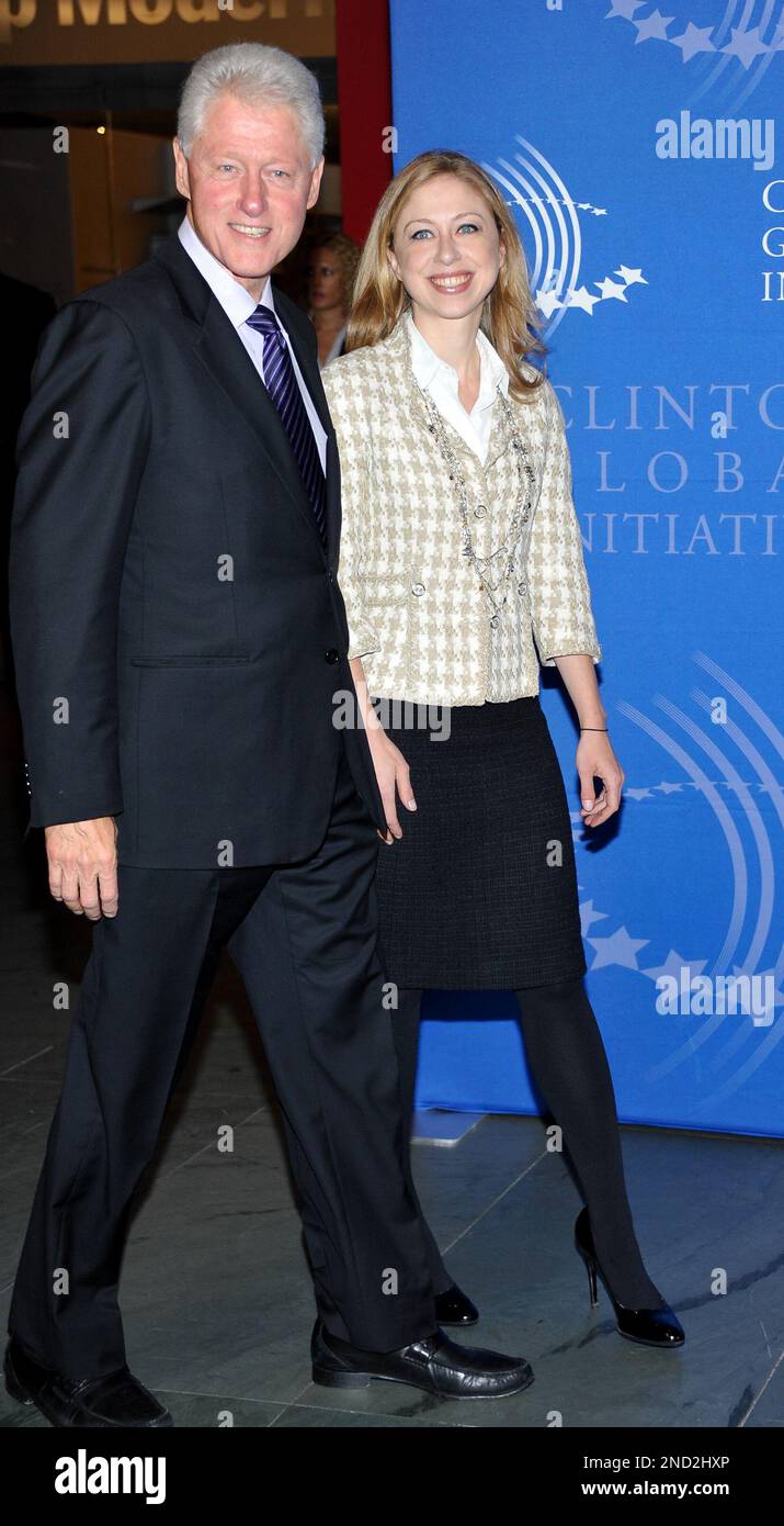 Former U.S. President Bill Clinton and his daughter Chelsea attend the ...