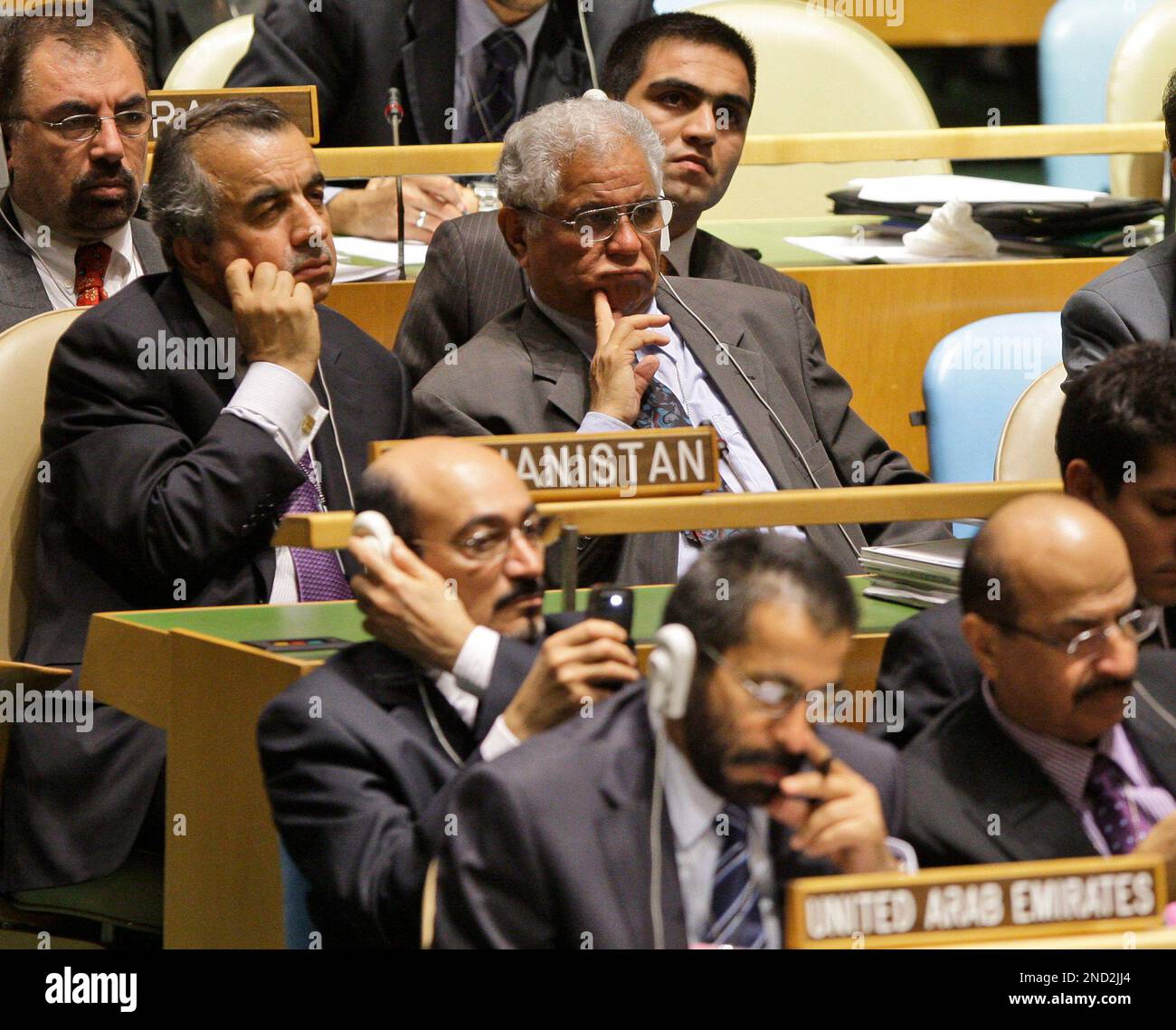 Representatives from Afghanistan look on as President Barack Obama ...