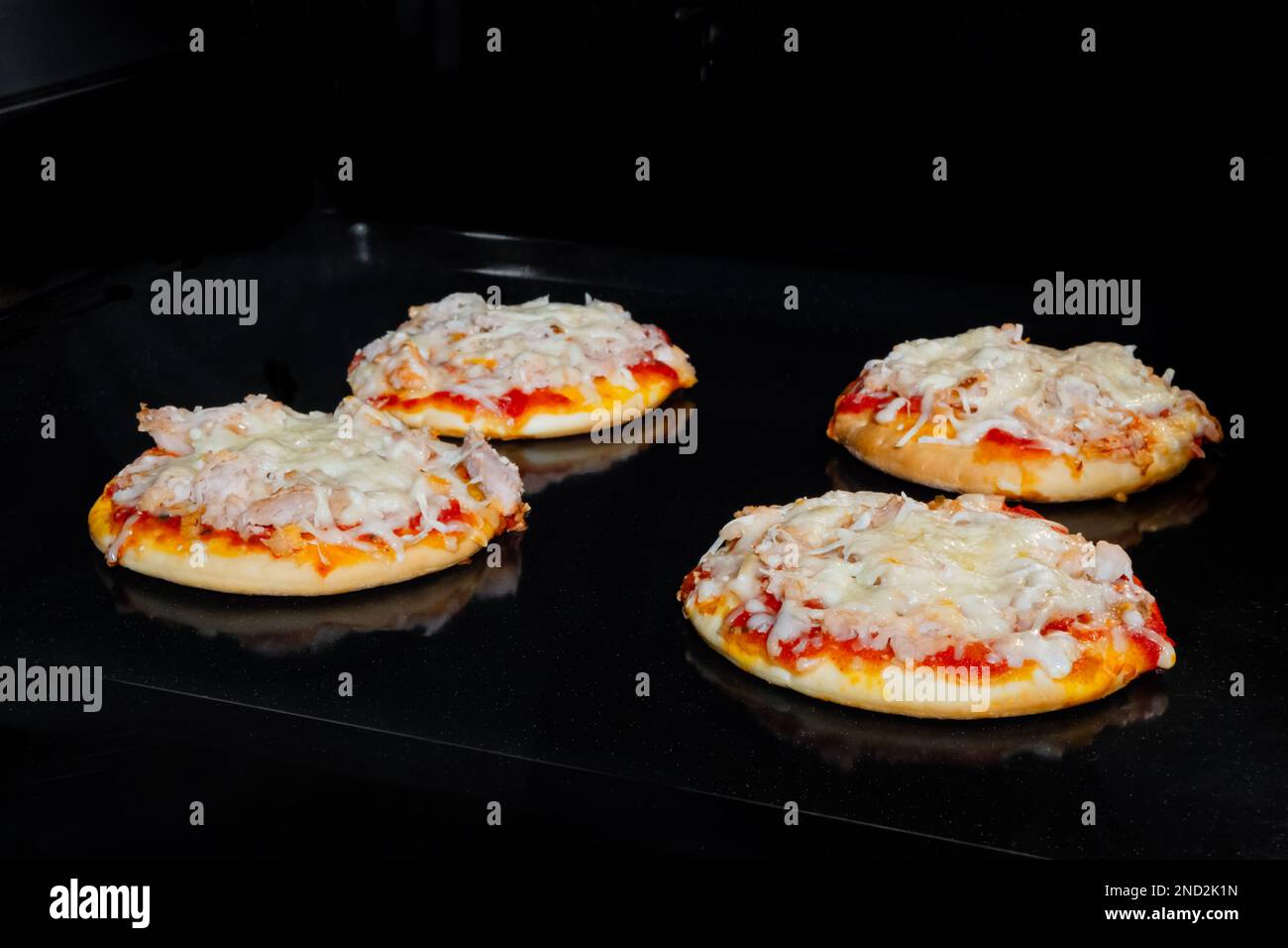 Mini pizzas baking sheet hi-res stock photography and images - Alamy