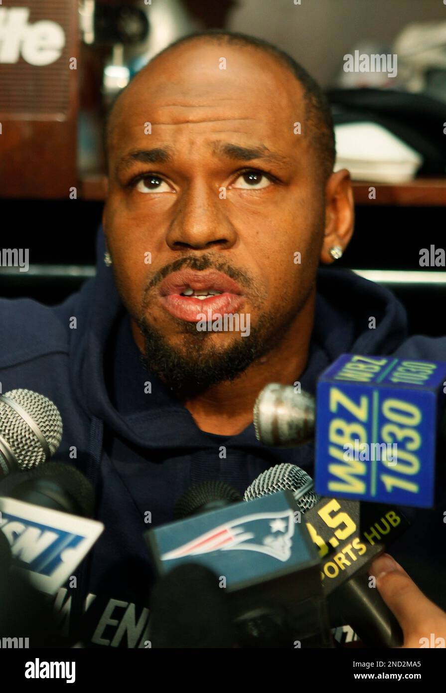 New England Patriots running back Kevin Faulk talks to reporters about ...