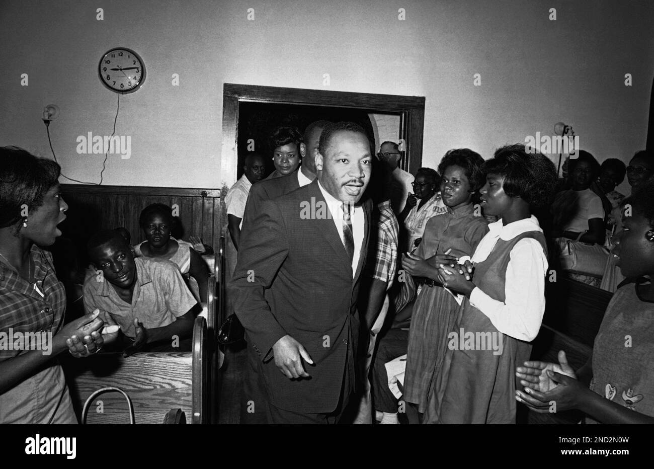 African American integrationist sing and clap their hands as Dr. Martin ...