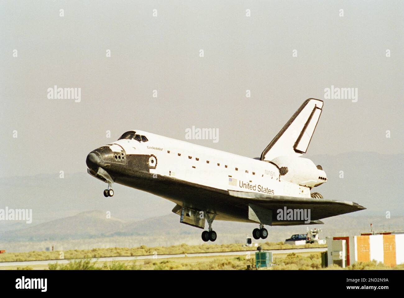 The Space Shuttle Endeavour lands safely at Edwards Air Force Base ...