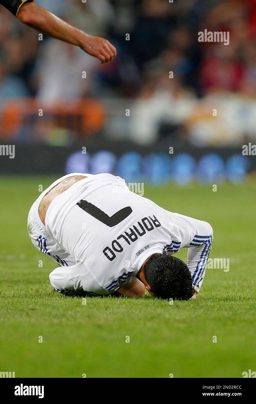 Real Madrid's Cristiano Ronaldo from Portugal falls to the ground after ...