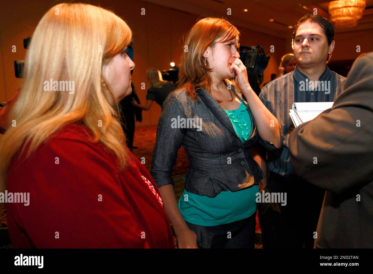 Sandy Watkins, left, listens as her daughter-in-law Jenifer Watkins ...
